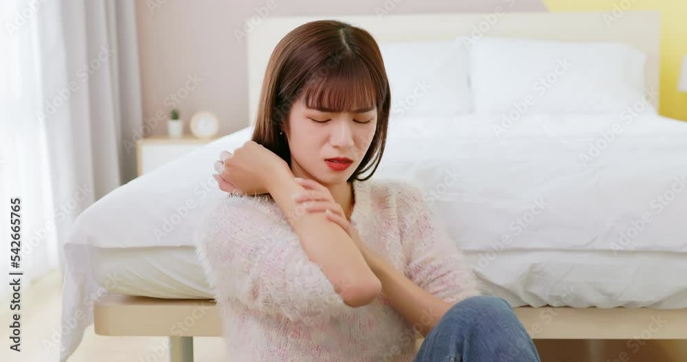 girl itching arm Stock Video | Adobe Stock