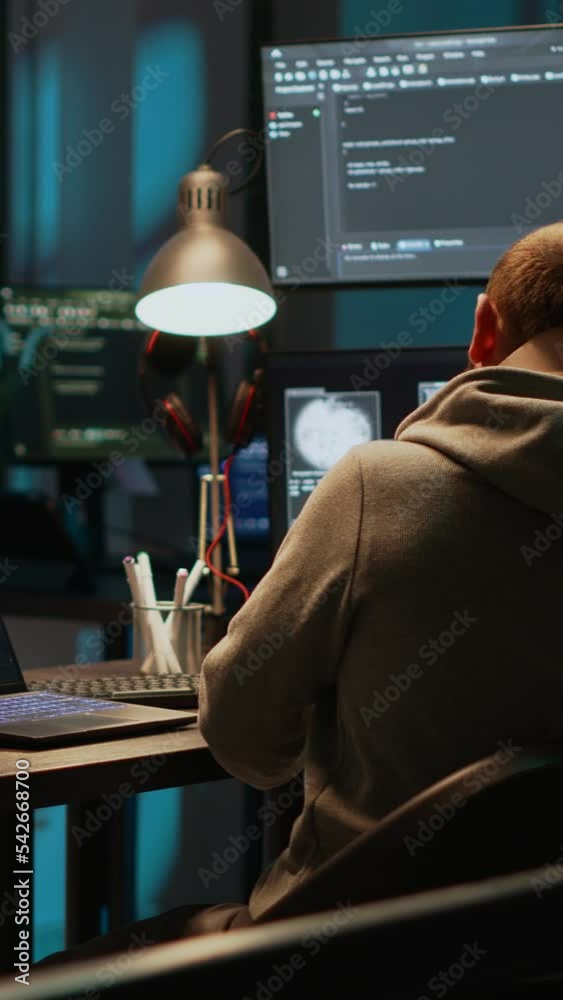 Vertical video: Database admin wearing cervical neck collar at web ...