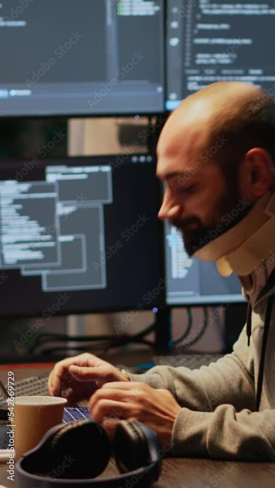 Vertical Video Adult Programmer With Neck Collar Foam Coding Html Script Using Laptop And