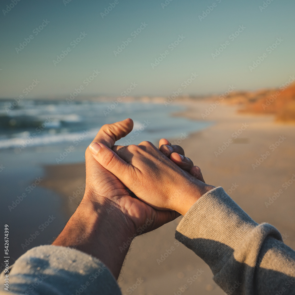 Holding hands Stock Photo | Adobe Stock