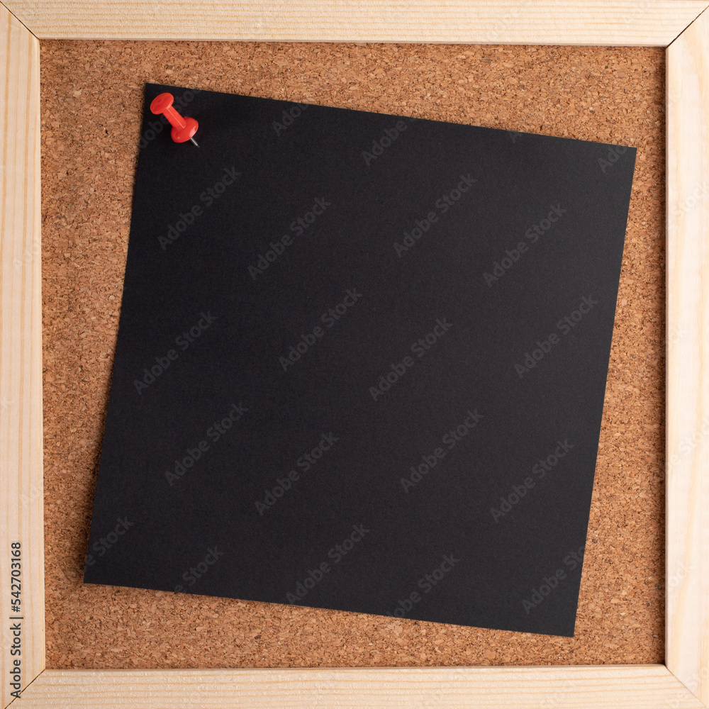 Cork note board with wooden frame with blank black square sheet for ...