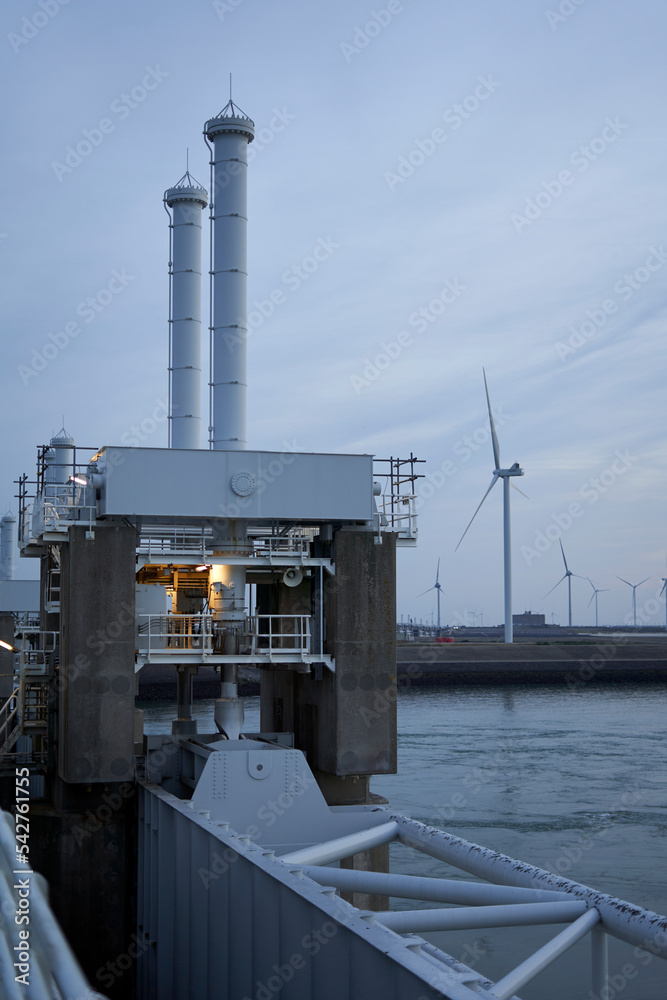 Dutch storm surge barrier (Deltawerke) on the water. Building device ...