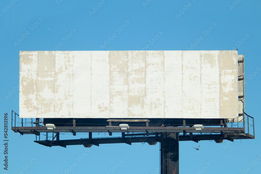 Damaged old billboard sign with texture in a clear blue sky Stock Photo ...