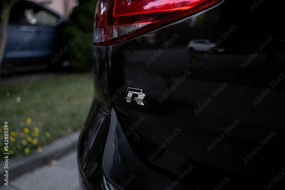 Closeup shot of the Volkswagen Golf R Emblem on Black Vehicle Stock ...