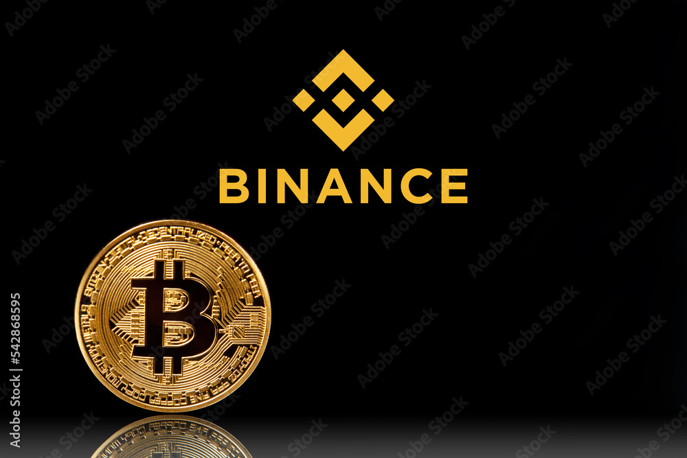 Binance logo with bitcoin on black background. Binance - one of the ...