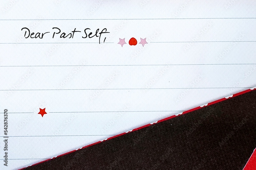 Letter with handwritten text DEAR PAST SELF, concept of self reflection ...