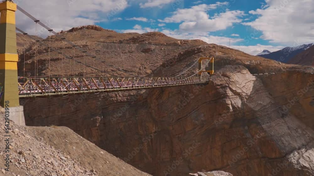 Chicham bridge in background of mountains during sunny day in Kibber ...