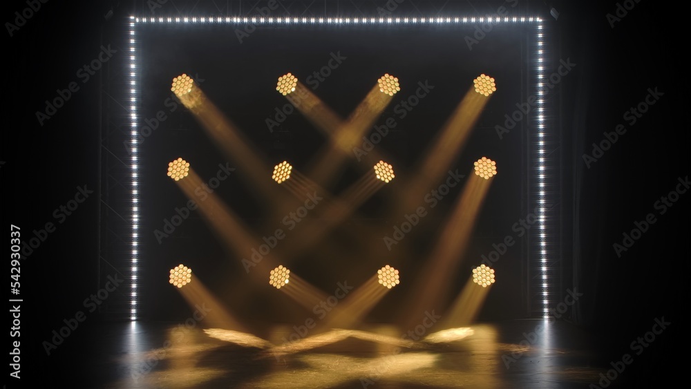 Stage light rays and smoke on empty dark concert scene. Professional ...