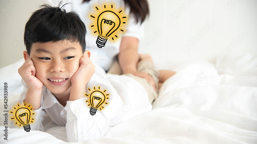 Portrait of child with idea bulb above the head. Brainstorming and idea ...
