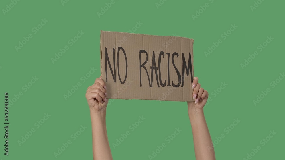NO RACISM. Protest text message on cardboard. Stop racism. Police ...