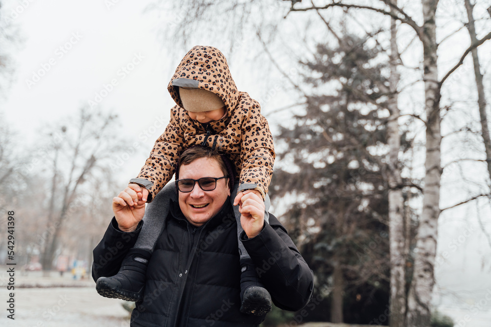 Father playing with child outdoors. Happy parenting, family bond ...