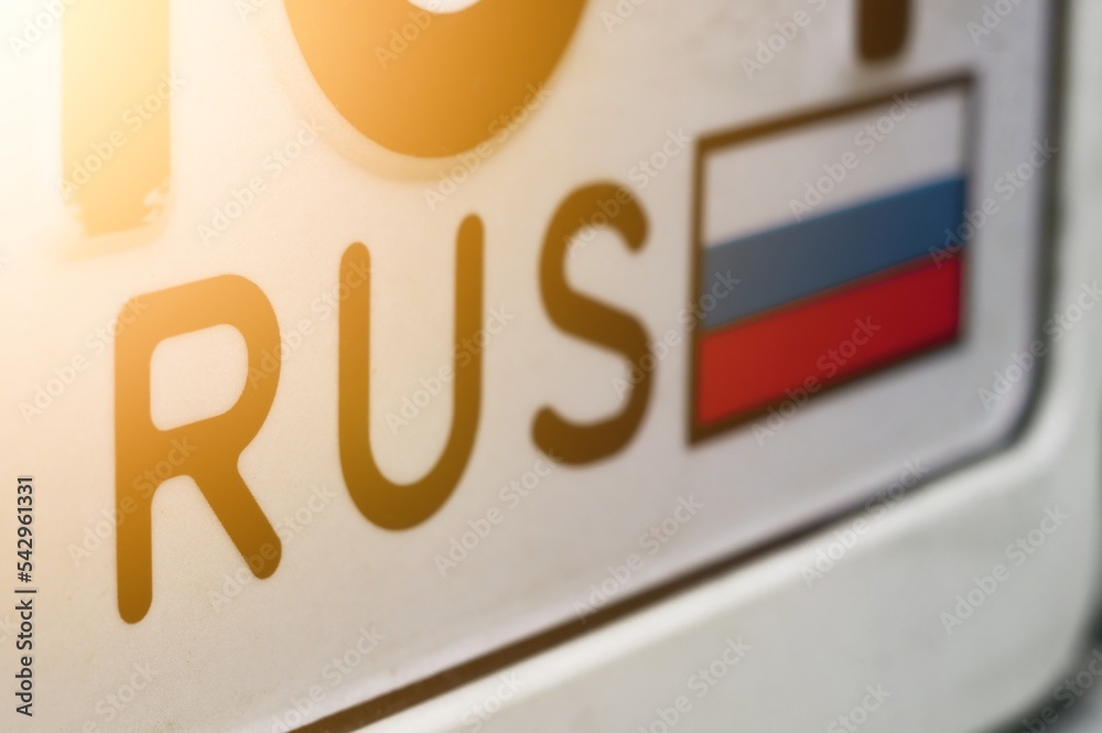 Russian flag on the registration number of the car. RUS region sign ...