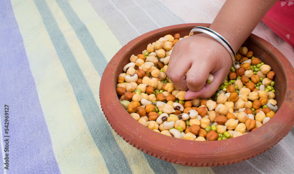 Kid Fist full of Mixed salad of soaked kala chana or black chickpeas ...