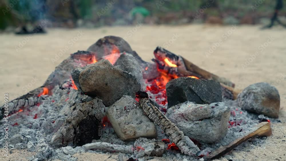 Bonfire with volcanic stones in the ritual Temazcal. Fire in which ...