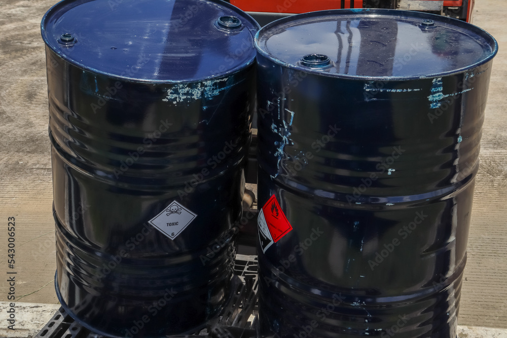 Warning symbol for chemical hazard on container Stock Photo | Adobe Stock