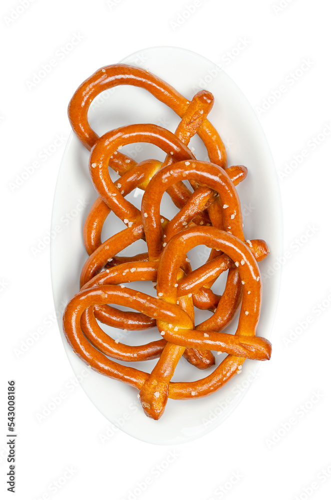Salted hard pretzels, also known as Brezel, in a white bowl. Popular ...