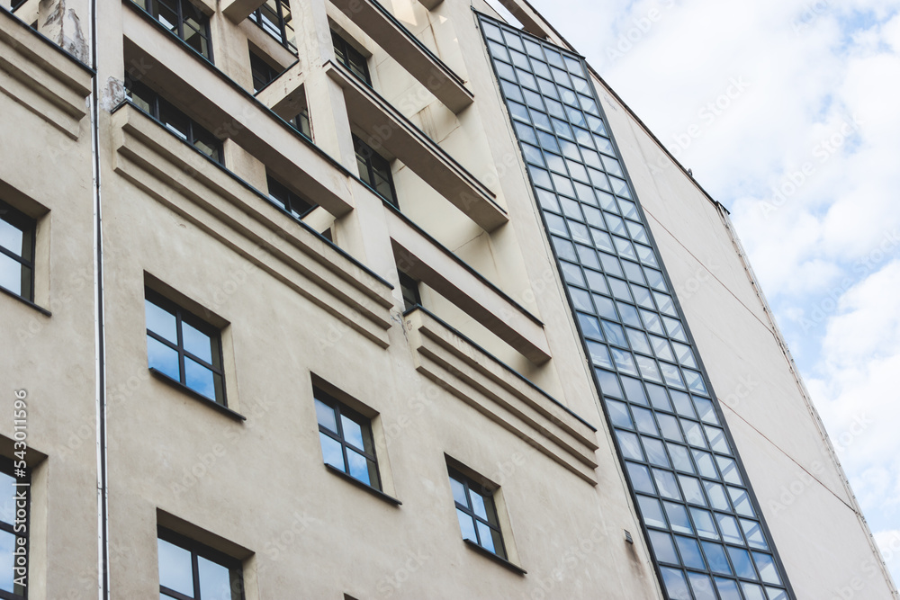 Office building design with windows and balconies on a cloudy sky Stock ...