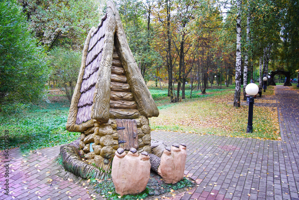 Wooden hut on chicken legs. A hut standing on chicken legs. Wooden ...