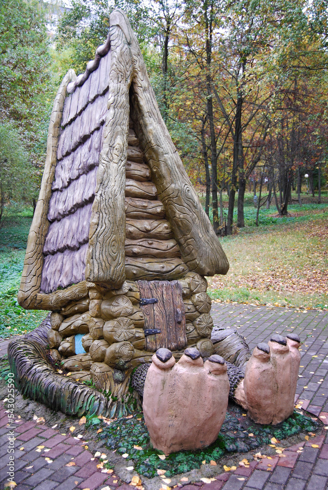 Wooden hut on chicken legs. A hut standing on chicken legs. Wooden ...