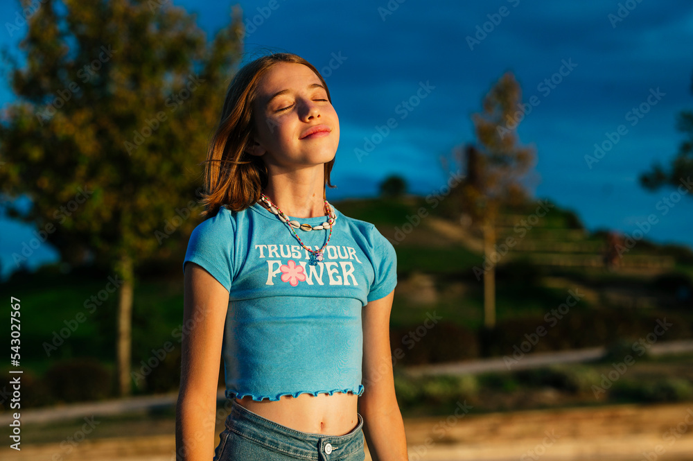The little girl very happy relaxed in nature. Stock Photo | Adobe Stock