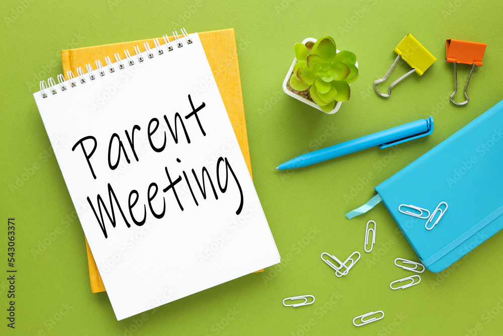 Meet Parents green background.notepad with text in calendar. Close-up ...