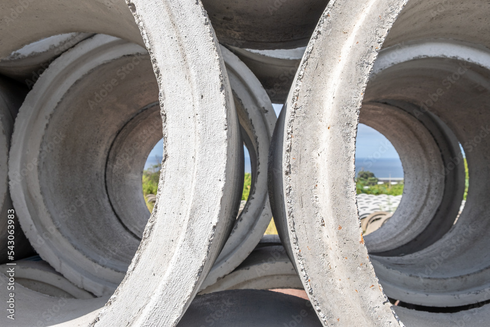 Concrete Shackles pilled up in a factory, on a construction site. Basic ...