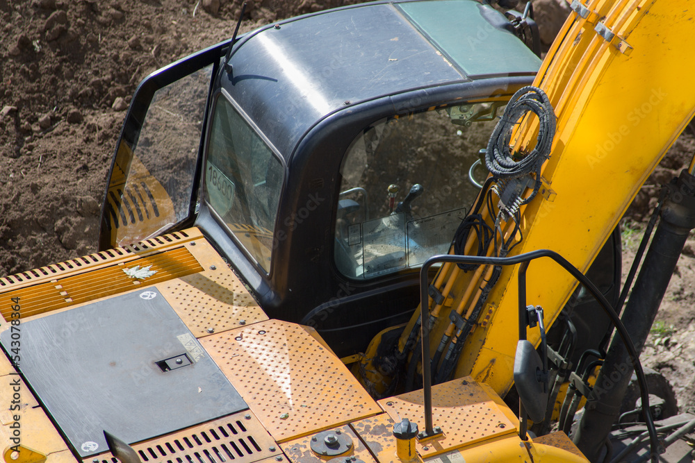 Excavator control cabin close-up. Excavator at the construction site ...