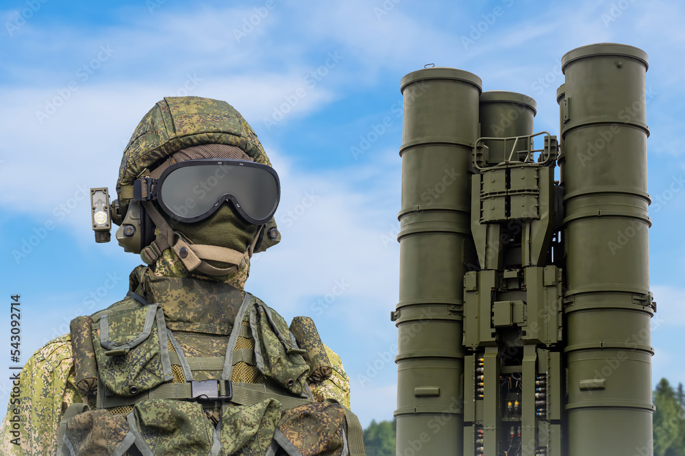 Rocket troops. Soldier near missile system. Man next to rocket launcher ...