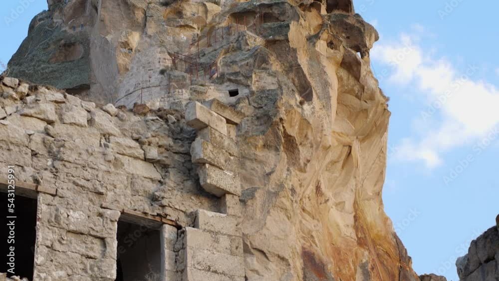 Rock with windows. A cultural heritage site in Turkey, Cappadocia. On ...