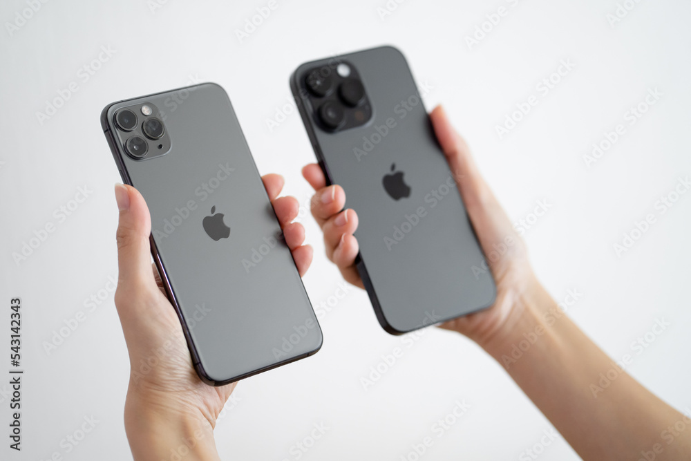 PENANG, MALAYSIA - OCT 10, 2022: Hand holding Apple iPhone 14 Pro Max ... PENANG, MALAYSIA - OCT 10, 2022: Hand holding Apple iPhone 14 Pro Max ...