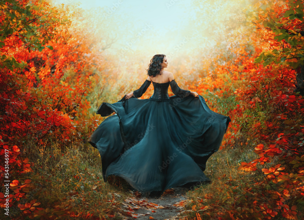 Fantasy woman goddess runs in autumn magic forest looks back. Long ...