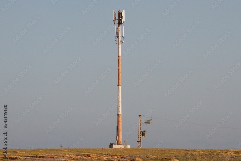 Automated weather observation system in the field on blue sky ...