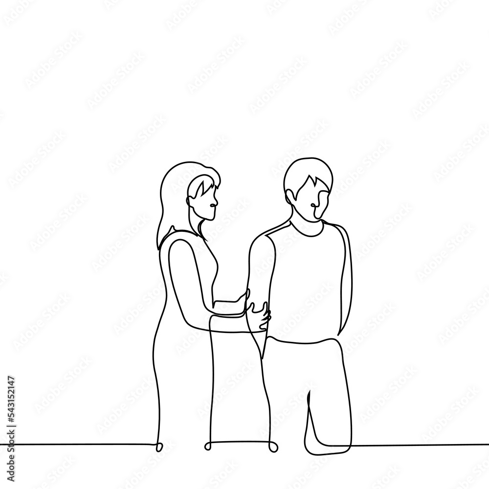 woman addresses man by holding or stopping him by the hand and man ...