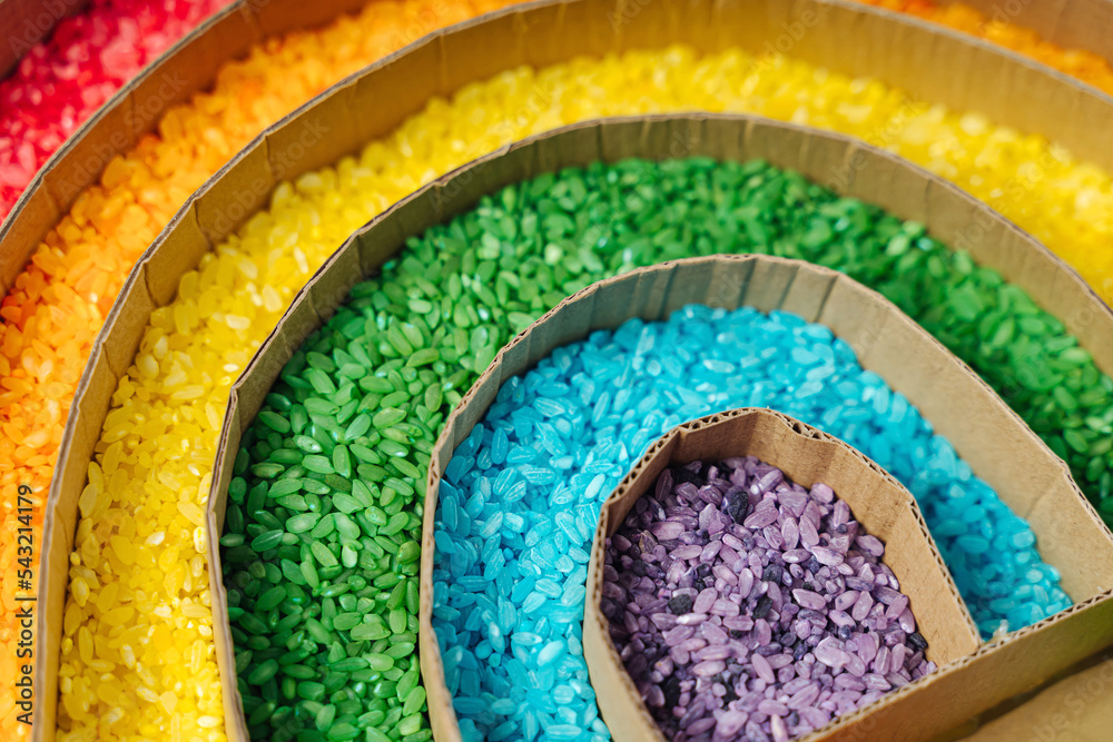 Rainbow filled with bright colored rice. Sensory bin for busy toddler ...
