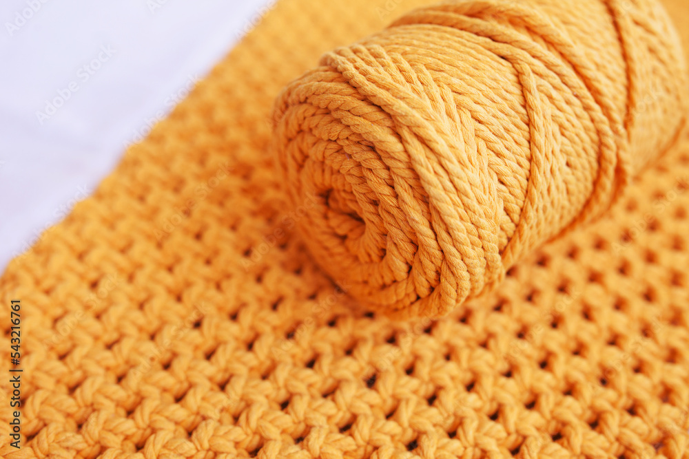 Handmade macrame braiding and cotton threads on ornate background ...