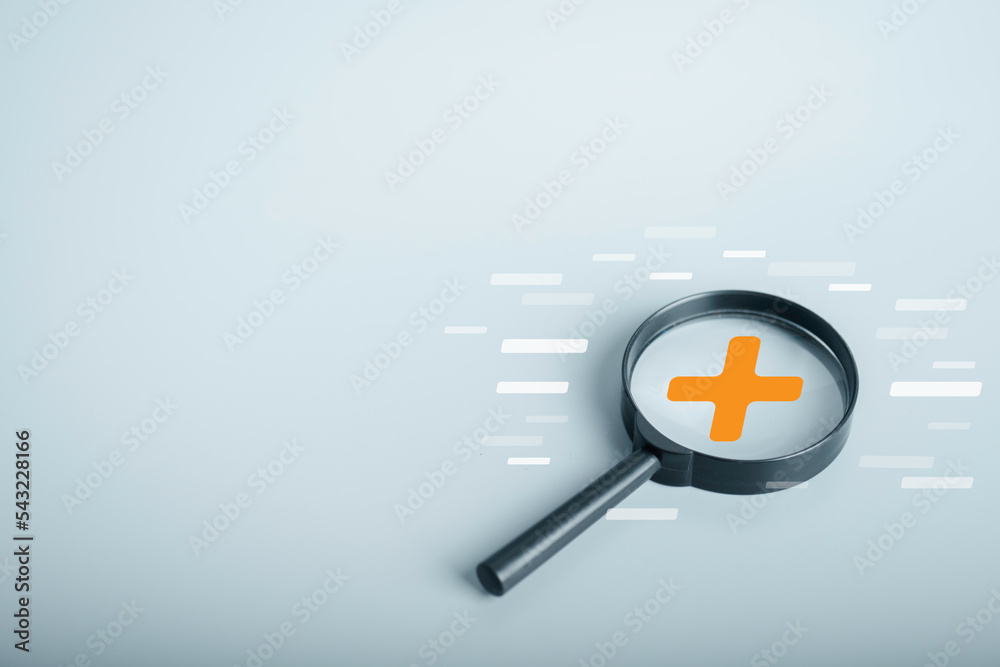Magnifying glass focus on Plus sign and minus sign around. Addition and ...