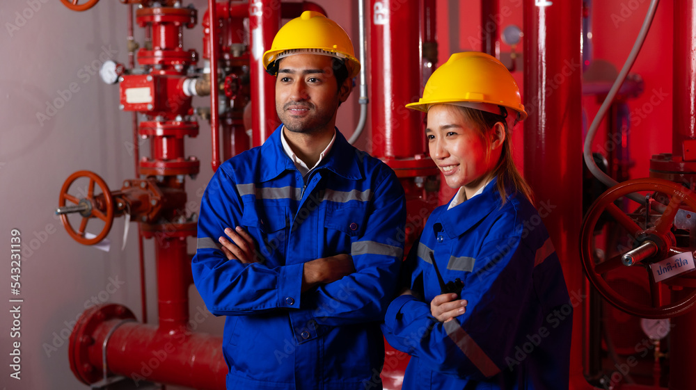 Portrait mechanical engineer team man and woman inspec quality water ...