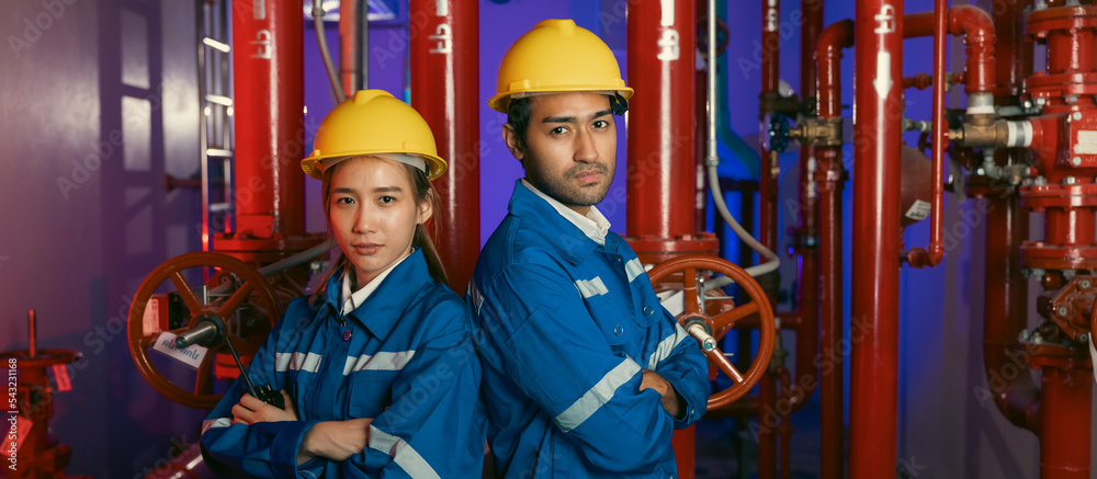 Portrait mechanical engineer team man and woman inspec quality water ...