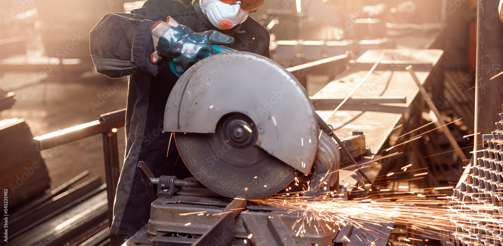 Poster Industry worker working electric wheel grinding on steel ...