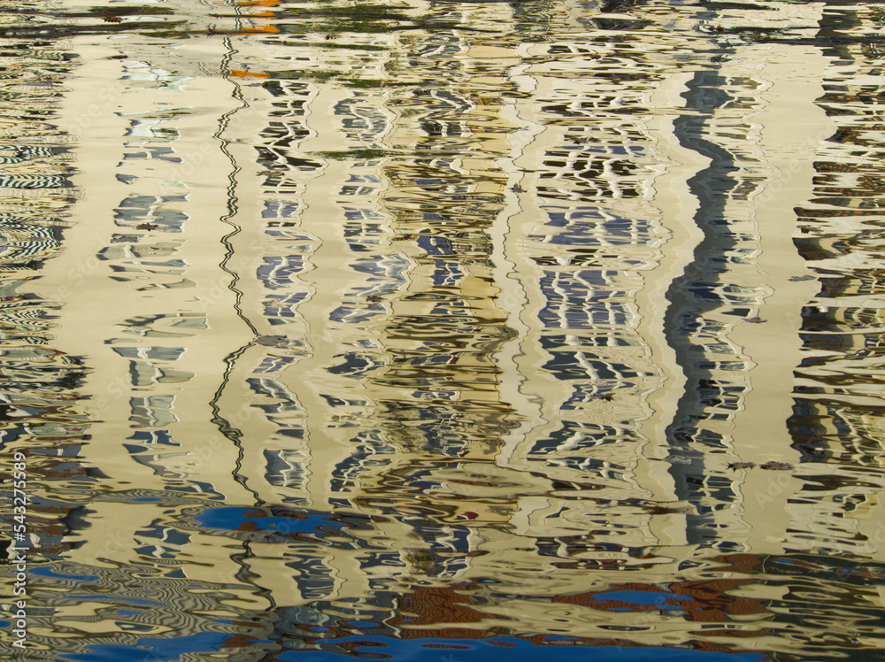 Water reflex background of yellow house. Abstract reflection and ...