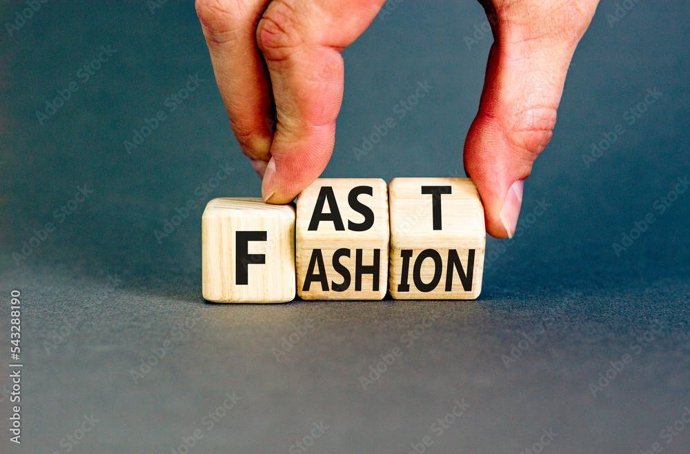 Fast fashion symbol. Concept words Fast fashion on wooden cubes ...