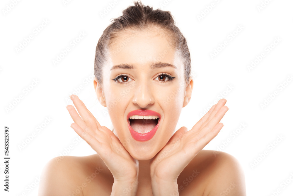 Beautiful girl studio portrait. Making hand gestures and face ...
