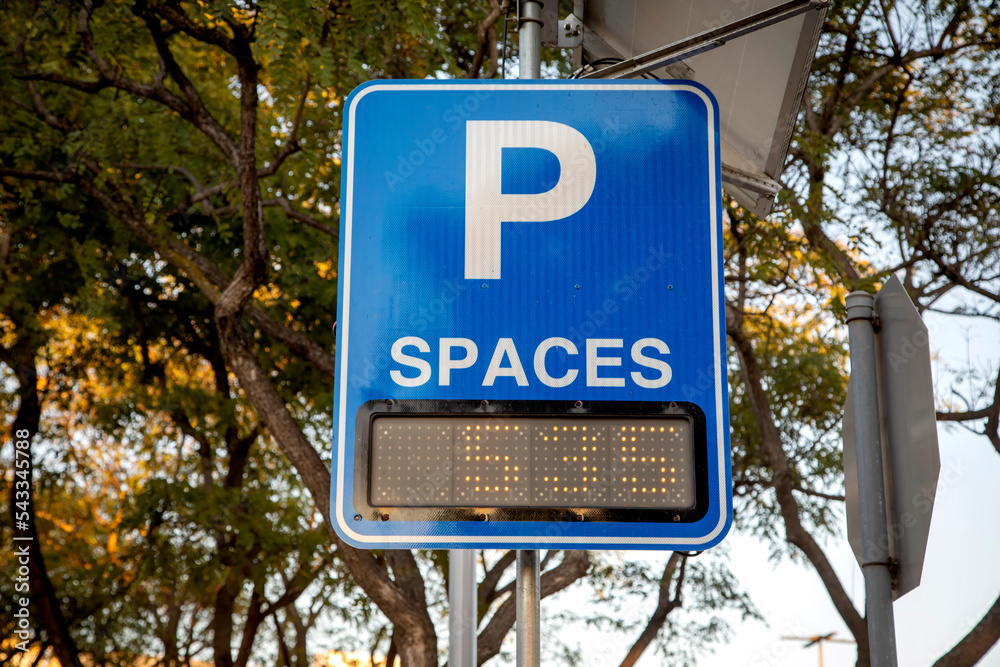 Blue sign stating how many parking spaces are available Stock Photo ...