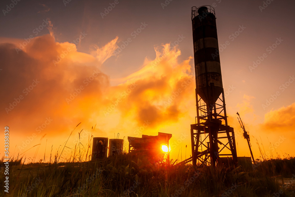 Landscape view during morning, sunrise at abandon cement silo at ...