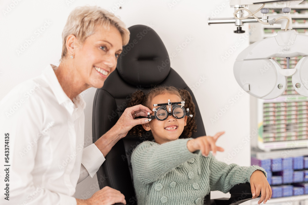 Child, eye exam and ocular health with ophthalmologist doing vision ...