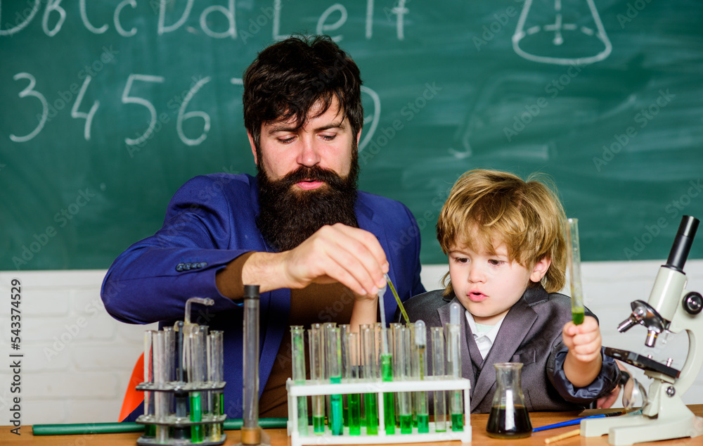 Laboratory test tubes and flasks with colored liquids bearded man ...