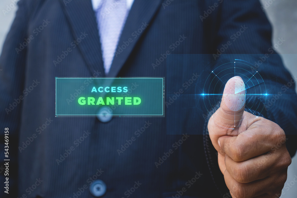 Access granted showing on virtual screen, thumb scan for account access ...
