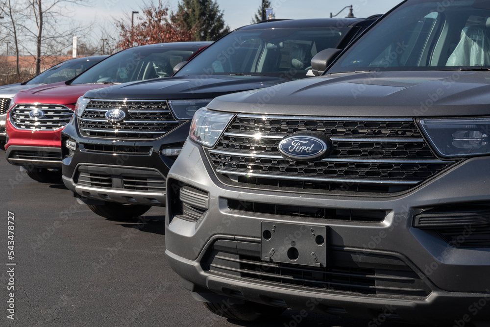 Ford Explorer display at a dealership. Ford offers the Explorer in a ...