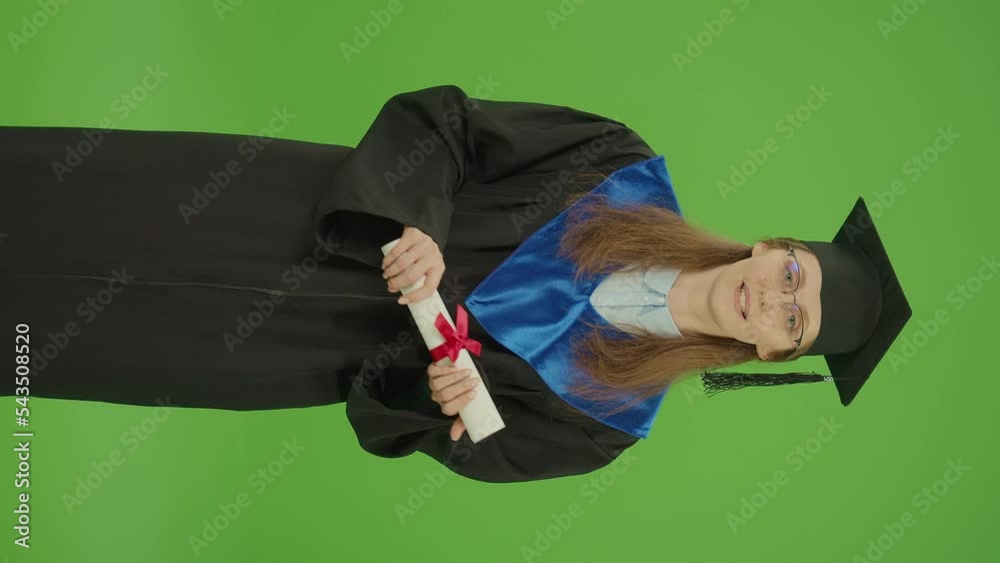 Vertical Video. Green Screen. Chroma Key. Female Graduate Holding ...