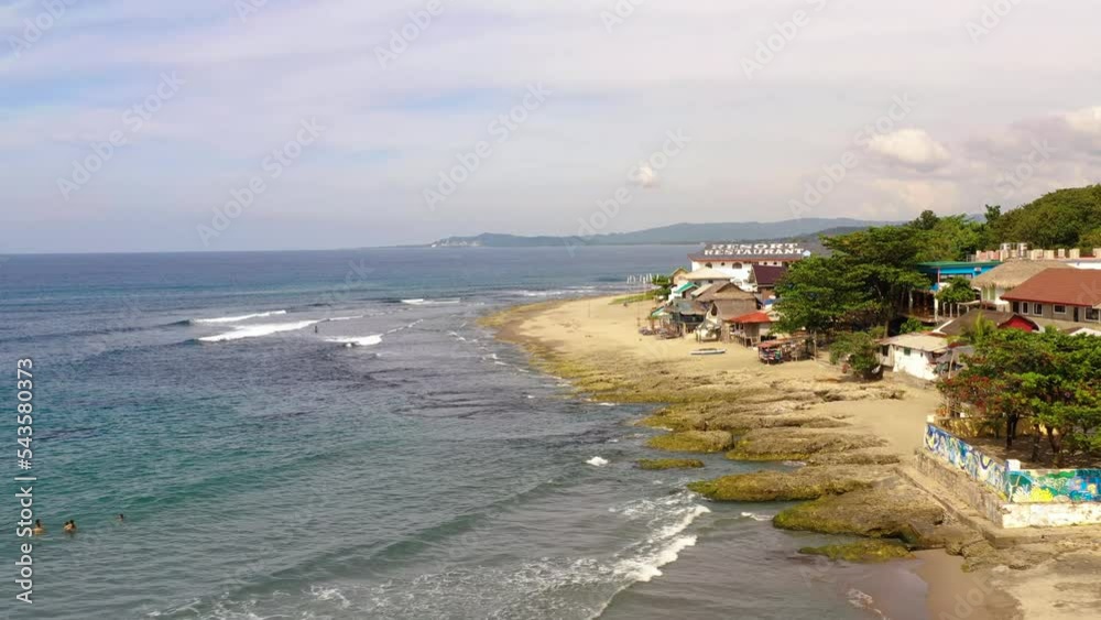 Coastal town with a surfer beach. San Juan, La Union, Philippines ...